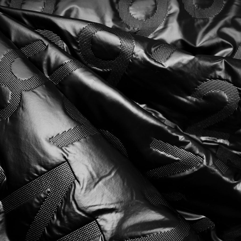 Lustrous Alphanumeric Quilted Puff Coating Black – Style Maker Fabrics