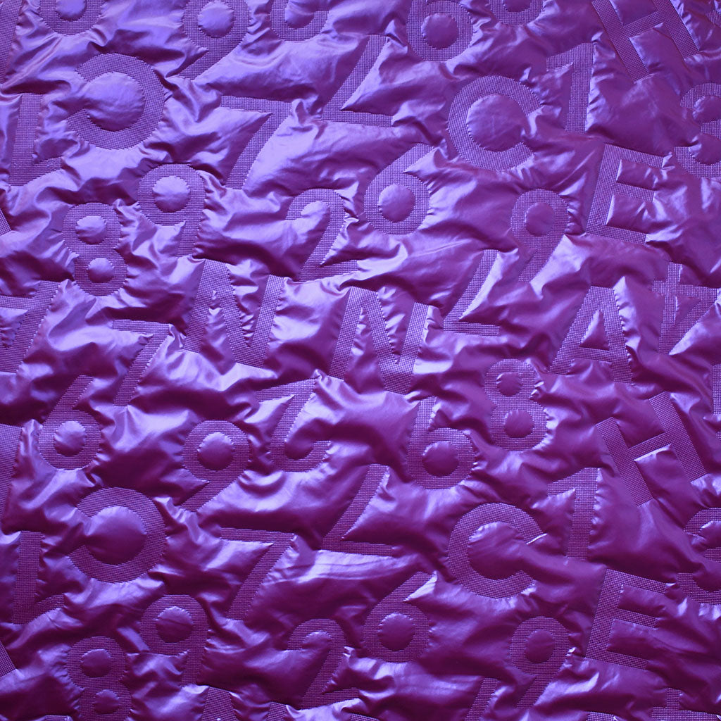Lustrous Alphanumeric Quilted Puff Coating Purple – Style Maker Fabrics